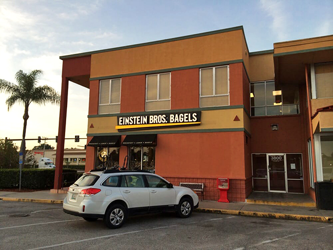 Even the building looks like it's smiling. Einstein Bros. knows the secret to happiness: easy parking and easier access to bagels.