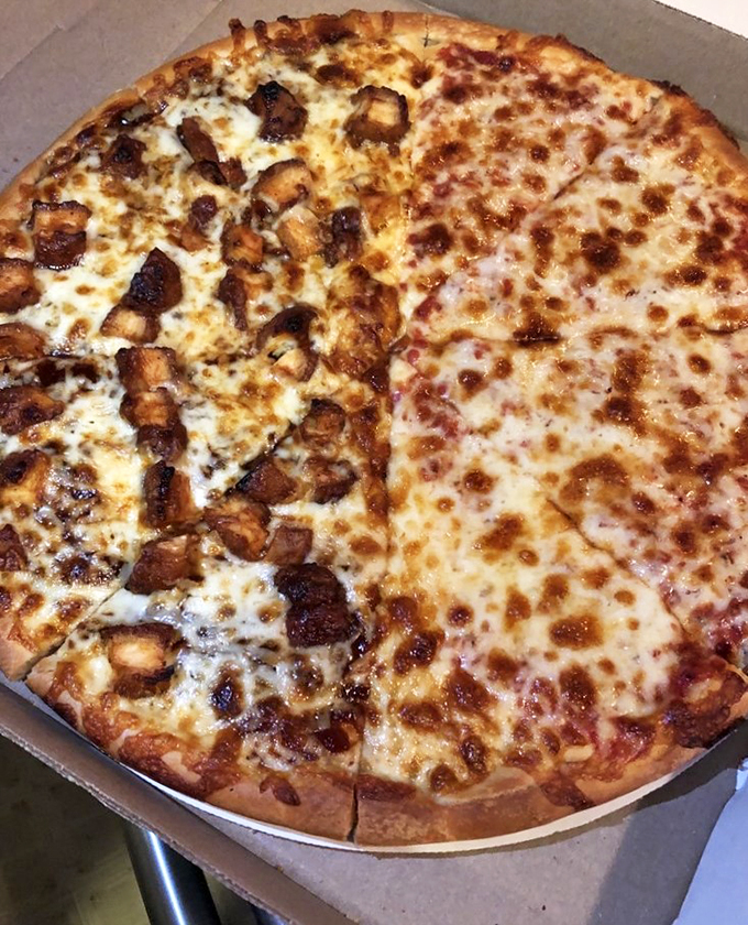 Pizza perfection, half and half! One side's feeling meaty, the other's cheese dreams &ndash; it's the best of both worlds.