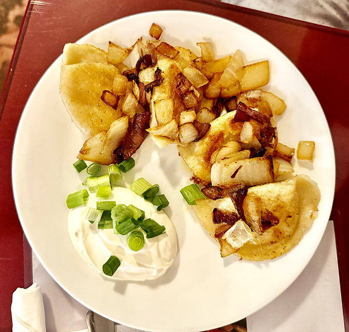 Pierogi perfection! These little pockets of potato and cheese goodness are like edible pillows of comfort. Grandma would approve. Photo credit: Nicolle Profenno