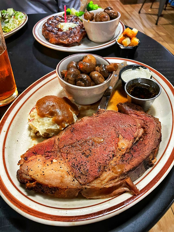 Now that's what I call a knife and fork affair! This prime rib's so juicy, you might need a rain poncho. Carnivore heaven, served with a side of bliss.