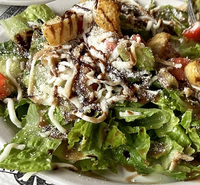 A salad that's dressed to impress! It's got more layers than a Shakespearean plot, and twice the drama. Photo credit: Amber N.