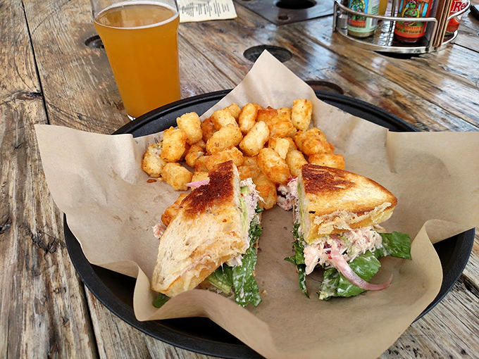 A sandwich so good, it'll make you question your relationship with bread. Paired with those golden taters, it's a match made in comfort food heaven.