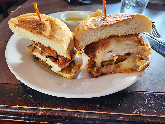 Sandwich perfection achieved! This beauty is stacked higher than a Jenga tower, but unlike Jenga, the only thing falling will be your inhibitions. Photo credit: Ehrin S.