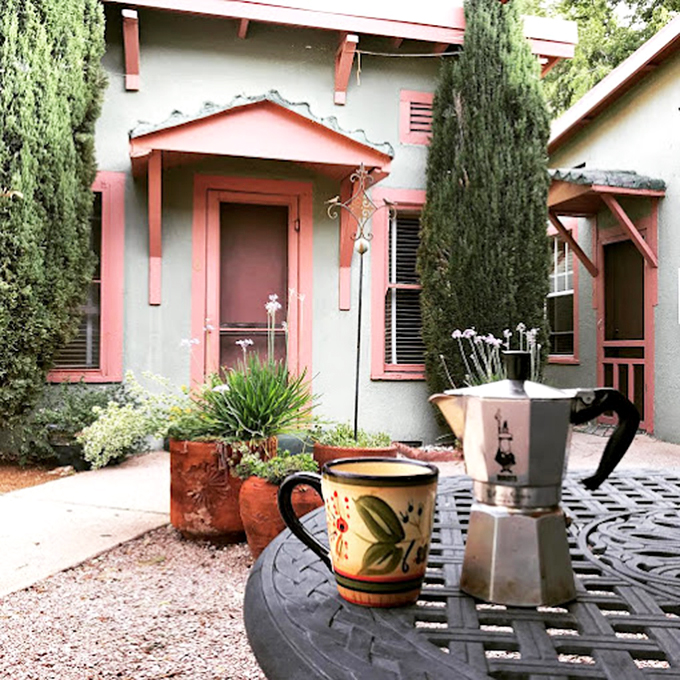 Morning coffee takes on new meaning when served in handcrafted mugs against this charming desert backdrop.