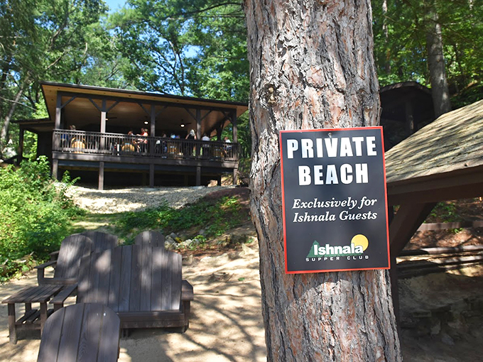 No trolls here! Ishnala's "private beach" sign promises an exclusive lakeside experience that's pure Wisconsin magic.