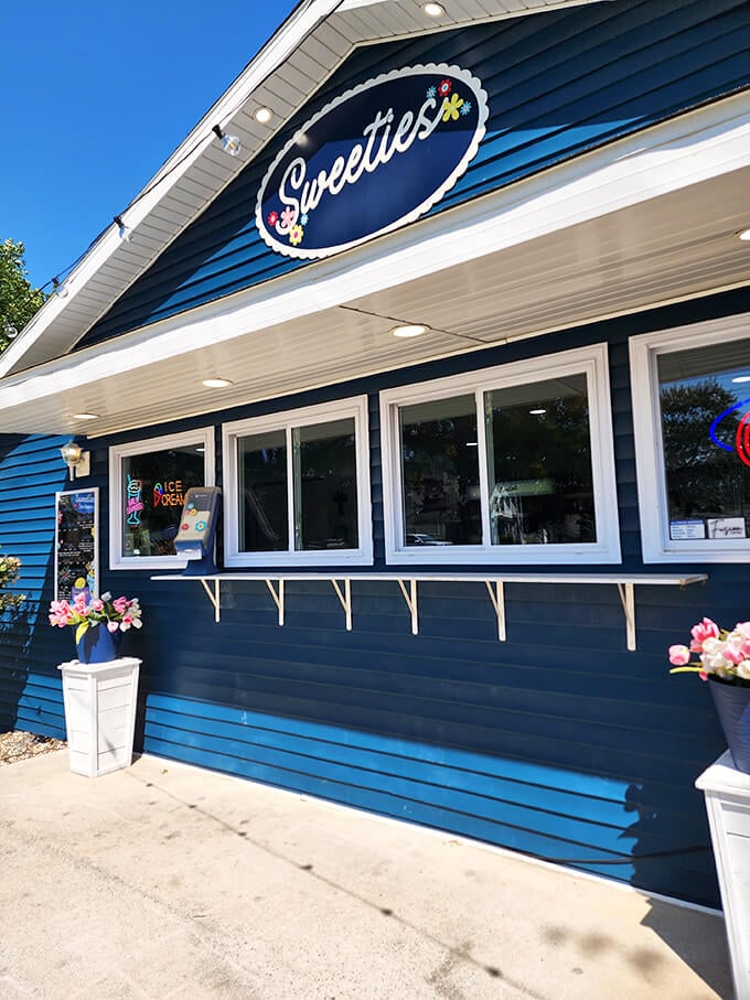 By day, a charming blue candy haven. By night, a glowing beacon of sweetness visible from three towns over!