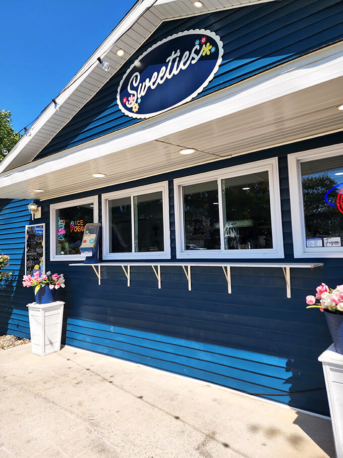 By day, a charming blue candy haven. By night, a glowing beacon of sweetness visible from three towns over!