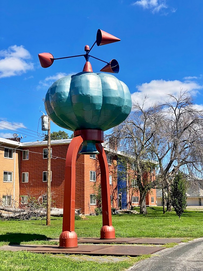 It's not easy being green... or red... or whatever color this chameleon-like sculpture decides to be. Art that keeps you guessing!