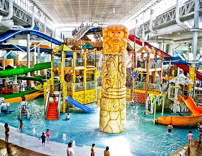 An indoor African-themed wonderland where towering sculptures and colorful slides create an exotic waterpark paradise.