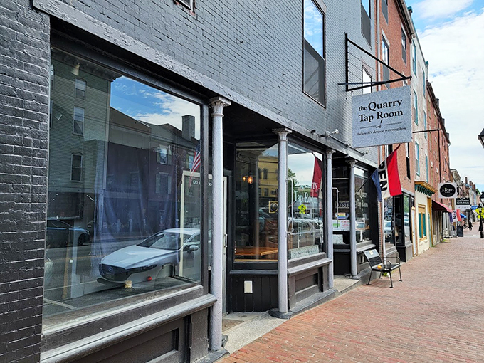 The Quarry's understated exterior hides a world of craft beer wonders. It's like a speakeasy, but the only password you need is "thirsty."