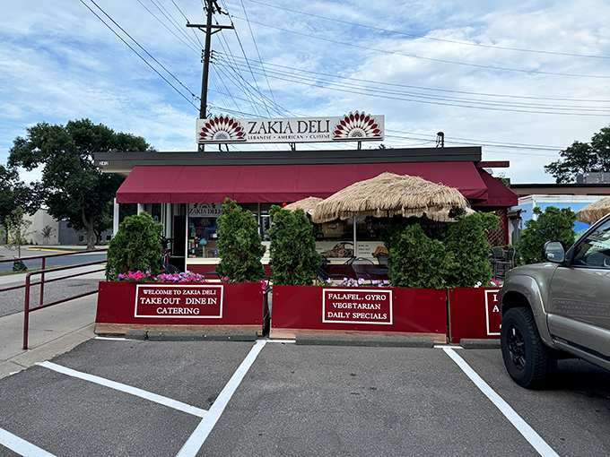 Red awning, green thumb! Zakia's flower boxes are almost as colorful as their menu. Almost. 