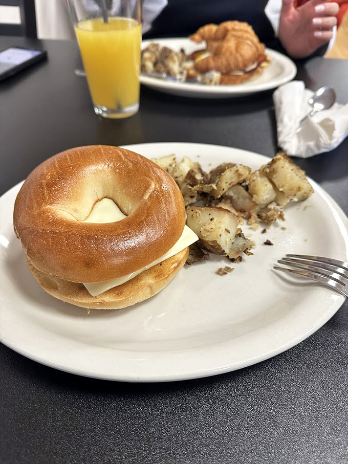 The breakfast sandwich that puts your sad desk lunch to shame. It's like a portable feast for champions.