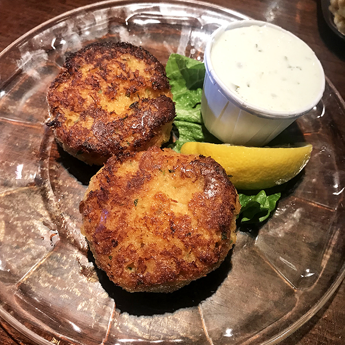 Crab cakes that could make a mermaid swap her tail! Golden-brown, plump, and ready to rock your world with oceanic delights.