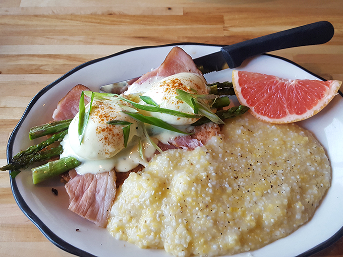 Asparagus Benedict with grits? Someone's been reading my dream journal. The hollandaise sauce practically glows with happiness.