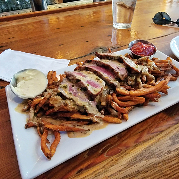 A plate that screams "treat yo' self!" This steak and fries combo is the comfort food equivalent of a warm bear hug from a lumberjack.