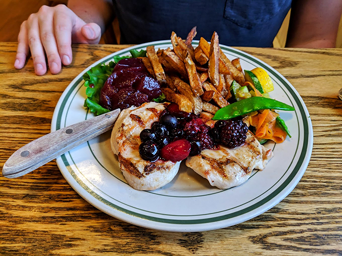 Who knew heaven came on a plate? Juicy grilled chicken, crispy fries, and a salad for good measure. It's like your taste buds won the lottery.