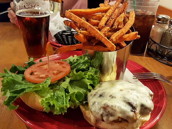 Behold the Tavern Burger in all its glory! It's like the Avengers of sandwiches - each ingredient a superhero in its own right.