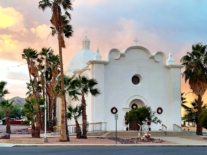 The Ajo Federated Church, where heavenly architecture meets earthly beauty. It's like someone took a wedding cake and turned it into a building &ndash; delicious to look at, but please don't lick the walls. Photo credit: J.B. Chandler