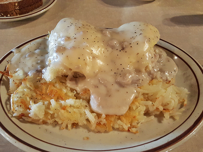 Hash browns, meet your new best friend. This biscuits and gravy combo is the breakfast equivalent of a warm bear hug.