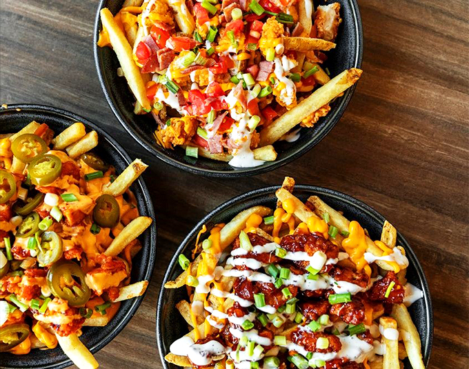 These loaded fries aren't just a side dish - they're a main event starring crispy potatoes dressed for success.
