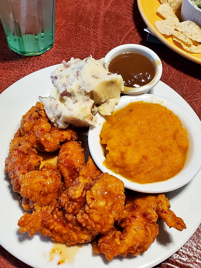 Golden-crispy wings with waffle fries and squash &ndash; because sometimes comfort food needs a side of more comfort food.