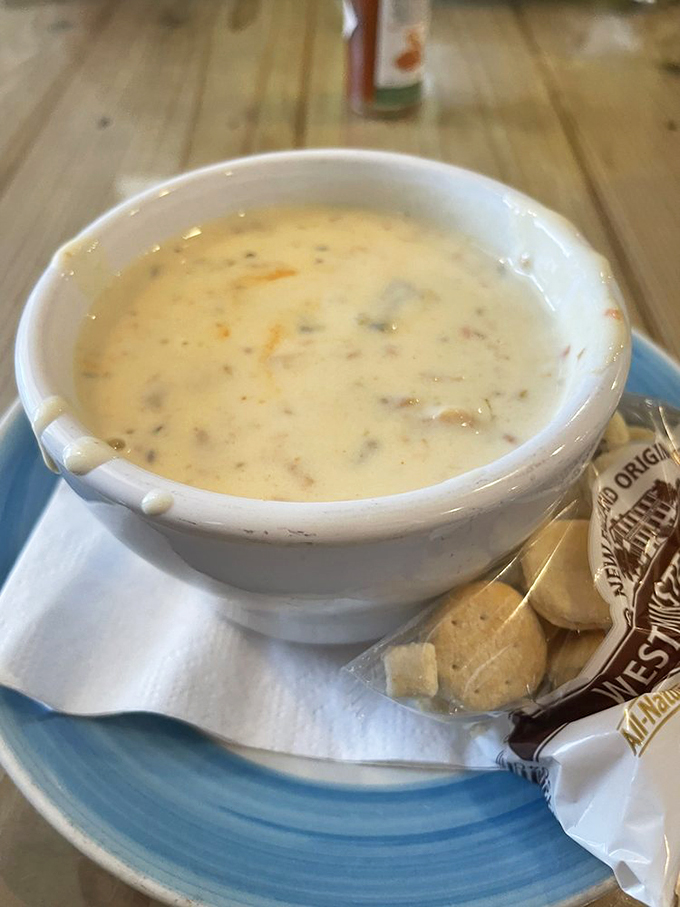 Creamy New England-style chowder topped with oyster crackers, comfort food that would make Neptune himself smile.