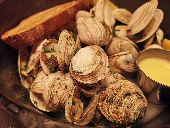 These steamed clams, bathed in herb butter, are Maine's answer to "What does happiness taste like?" Photo credit: Suchin Ratanasiriwilai