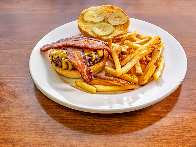 Holy cow, what a burger! This classic beauty, with its perfectly melted cheese and crispy bacon, is the James Dean of sandwiches – effortlessly cool and irresistible.