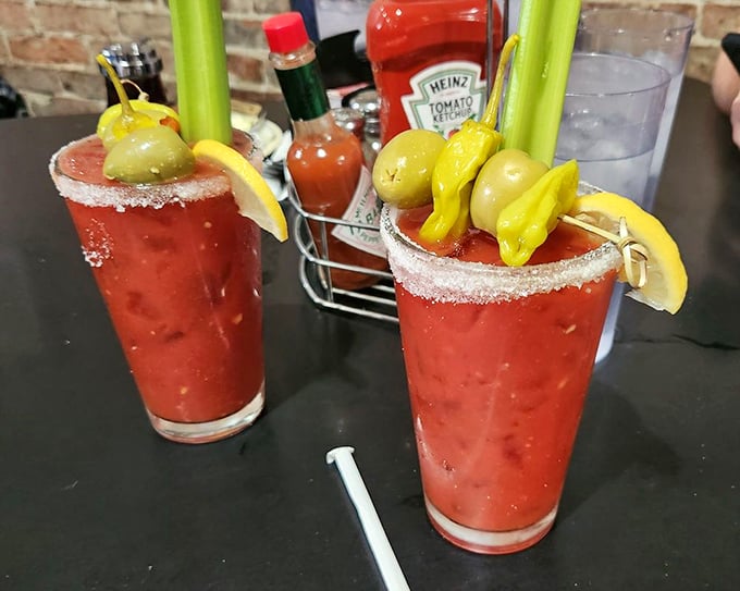 These Bloody Marys come fully loaded with garnishes that could qualify as a small appetizer platter.