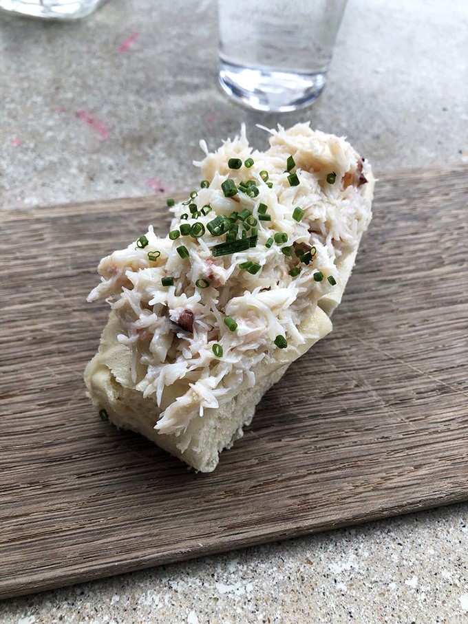 The crab roll: where succulent seafood meets pillowy perfection. It's like a warm hug from the sea, wrapped in a bun.