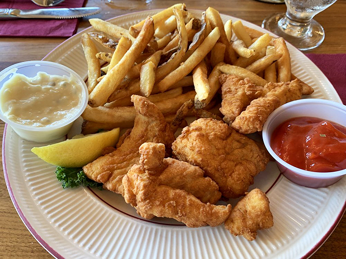 Golden-brown fish and chips that would make Neptune himself swim to shore for a bite. Photo credit: Cory C.