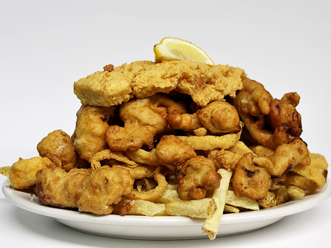 Golden-brown perfection that's crunchier than your ex's explanations, served with a splash of sunshine (that's the lemon).