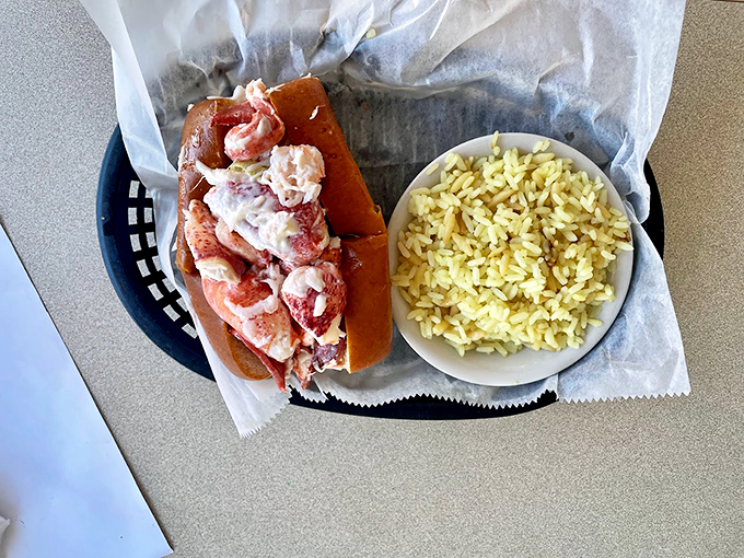 A lobster roll that's more lobster than roll, paired with perfectly cooked yellow rice. Maine's version of heaven on earth.