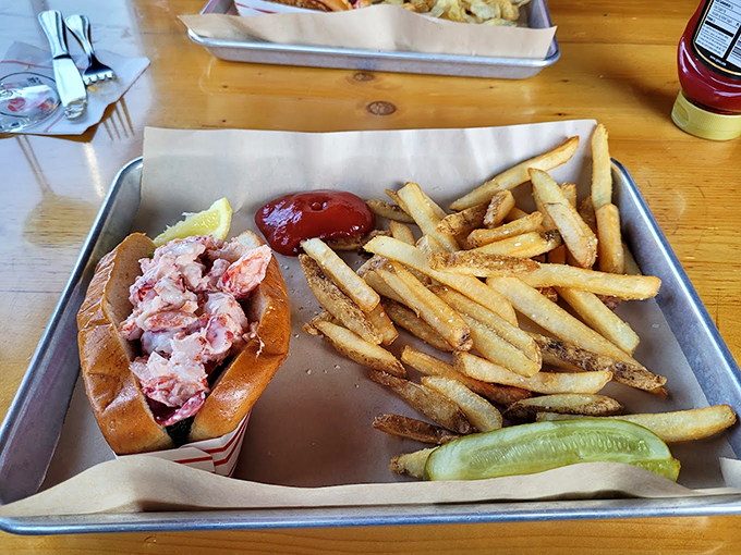 The perfect marriage: sweet lobster meat meets golden fries. A coastal combo that makes everything right with the world. 
