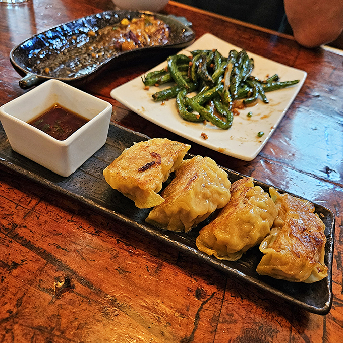 These potstickers are the Goldilocks of dumplings - not too crispy, not too soft, but just right for your taste buds' delight.