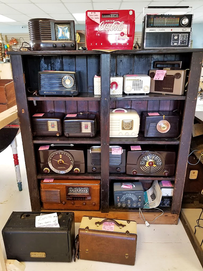 A symphony of vintage radios stands ready to broadcast memories from decades past. Tune in to yesterday's hits! 