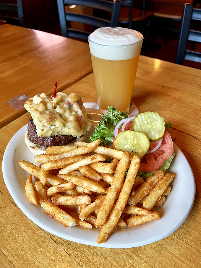 All aboard the flavor train! This mac 'n' cheese burger is like a warm, cheesy bear hug for your taste buds. Comfort food, full steam ahead! Photo credit: Casey's Caboose