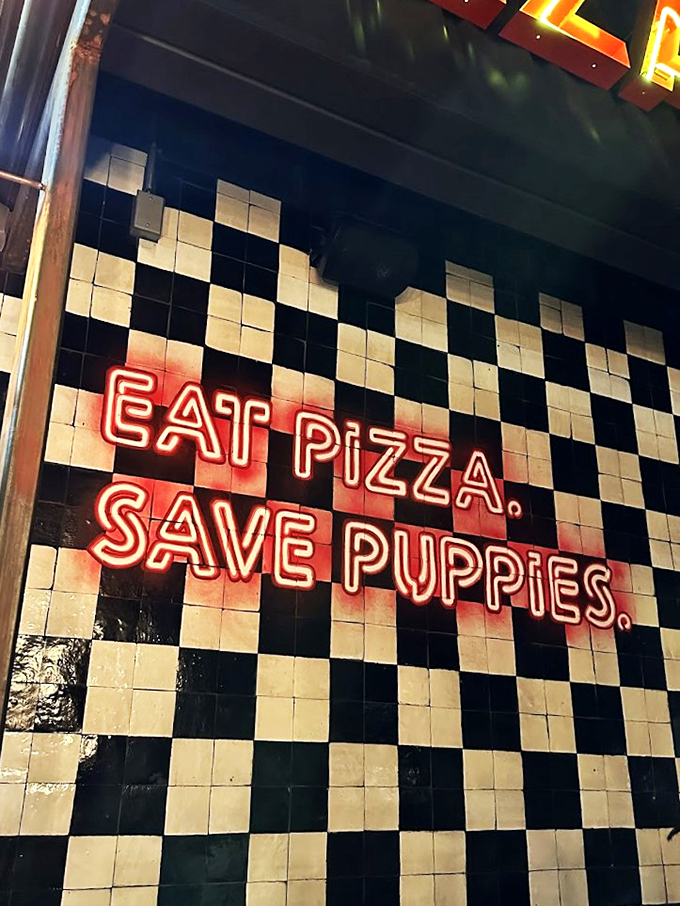 Against classic checkerboard tiles, this neon manifesto glows with purpose: eat well, do good. Simple as that.
