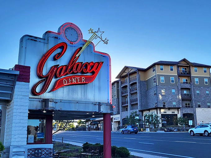 The Galaxy Diner sign: where retro meets the cosmos. It's not just a sign, it's a portal to a time when cars had fins and milkshakes cured everything.