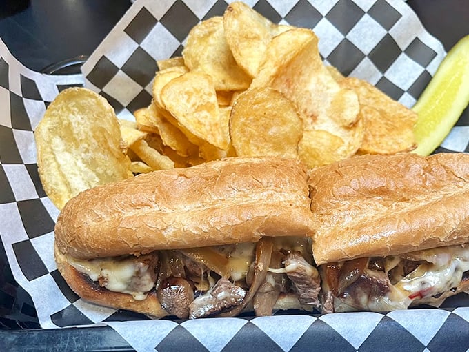 A grinder that means business: Loaded with mushrooms, melted cheese, and tender meat on a perfectly toasted roll.