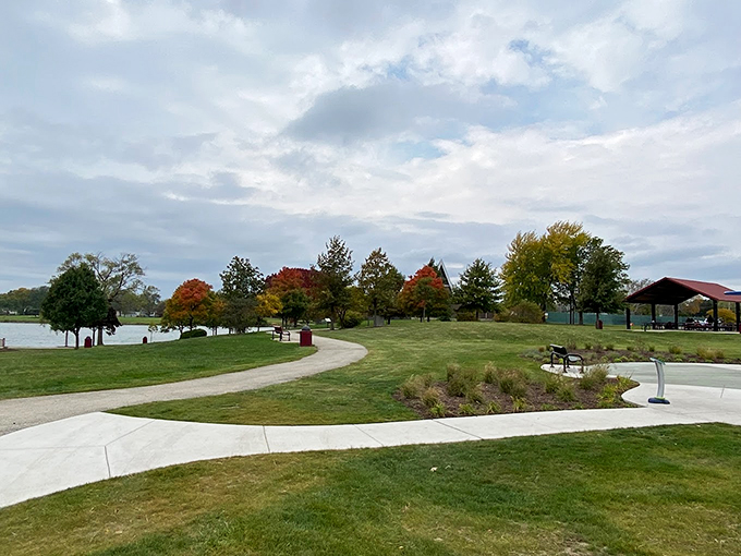 Autumn paints the park in golden hues while winding paths invite visitors to explore every scenic corner.