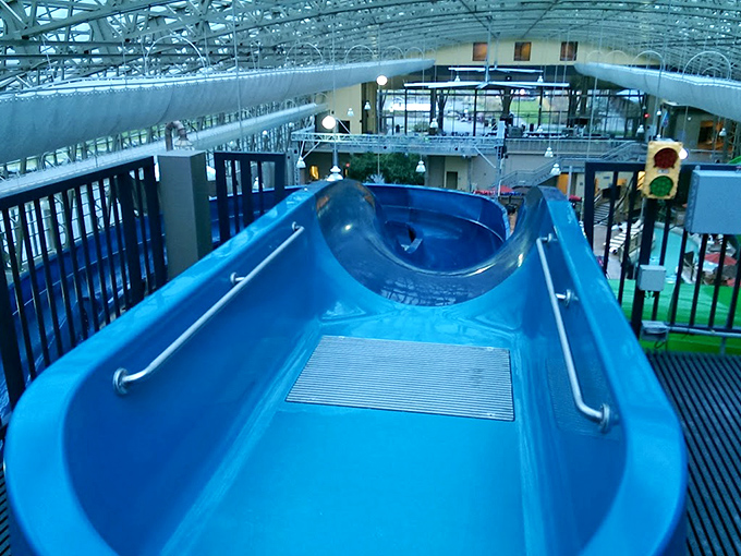 The calm before the splash: This blue slide entrance might look innocent, but it's about to deliver serious thrills.