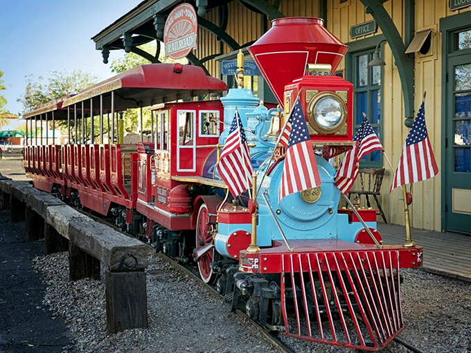 All aboard! This miniature train, decked in patriotic glory, promises adventures around every corner of Trail Dust Town.