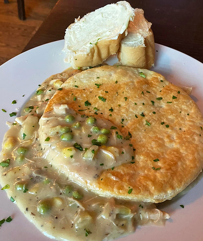 This pot pie isn't just comfort food - it's a warm, flaky hug filled with tender vegetables and rich gravy.