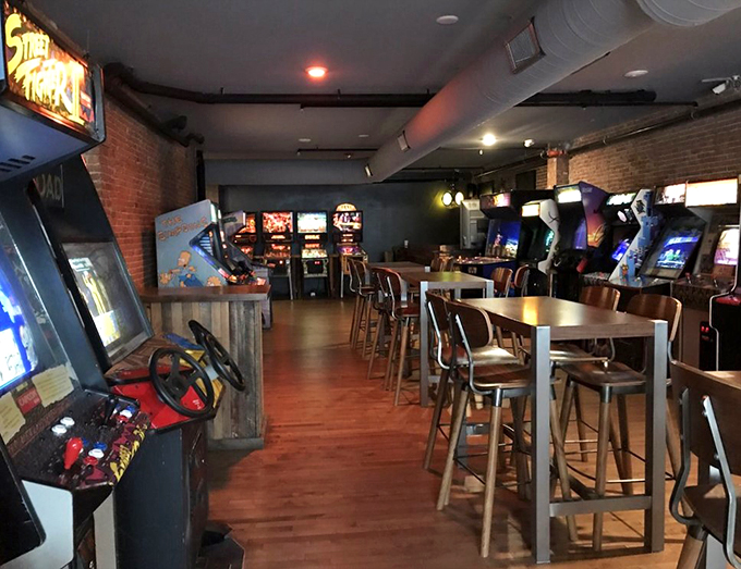 Where everybody knows your game. Patrons huddle around cabinets, proving that sometimes the best multiplayer experience doesn't need Wi-Fi.