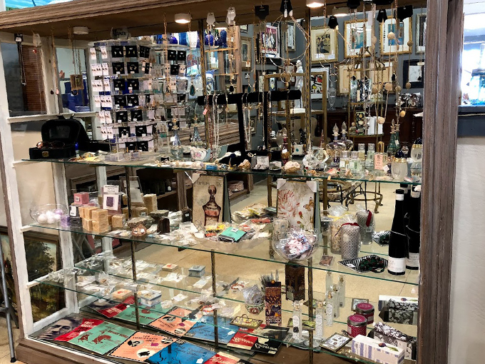 Authentic Traders, indeed! From quirky signs to cozy baskets, this booth is a treasure trove of "I didn't know I needed that!"