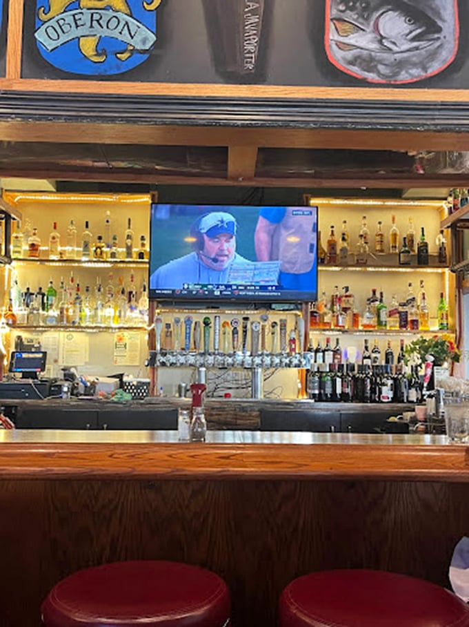 A classic Great Lakes bar setup that says "pull up a stool and stay awhile"&mdash;complete with sports on TV and enough spirits to warm any Michigan winter.