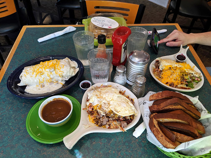 Breakfast of champions? More like breakfast of food gladiators! This burrito and skillet combo is ready to conquer your hunger pangs with cheesy, eggy gusto.