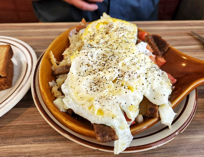 This breakfast skillet is a morning symphony of flavors. It's got more layers than your favorite '80s rock ballad, and twice the satisfaction.