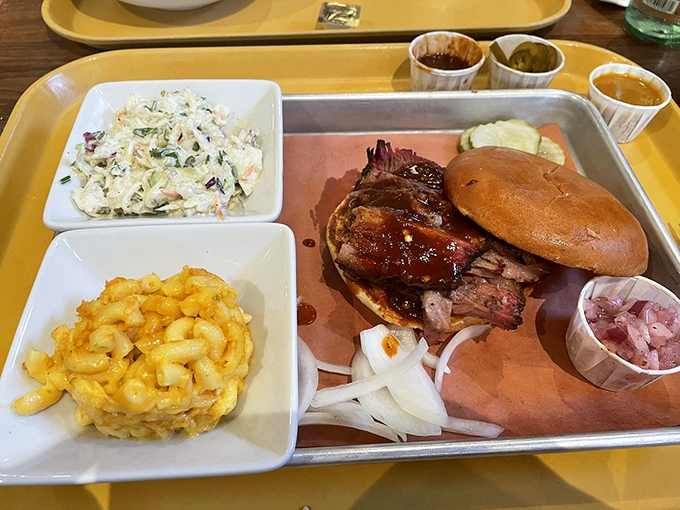 The Leaning Tower of Brisket! This sandwich is stacked higher than your grandpa's stories about walking to school uphill both ways.